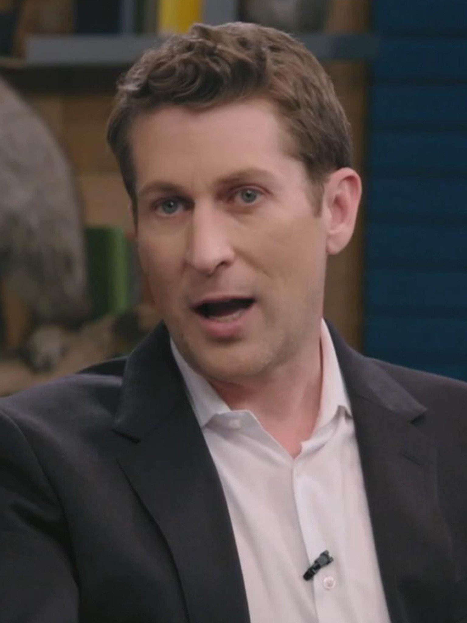 Scott Aukerman Wears a Tailored Black Suit Pictures - Rotten Tomatoes